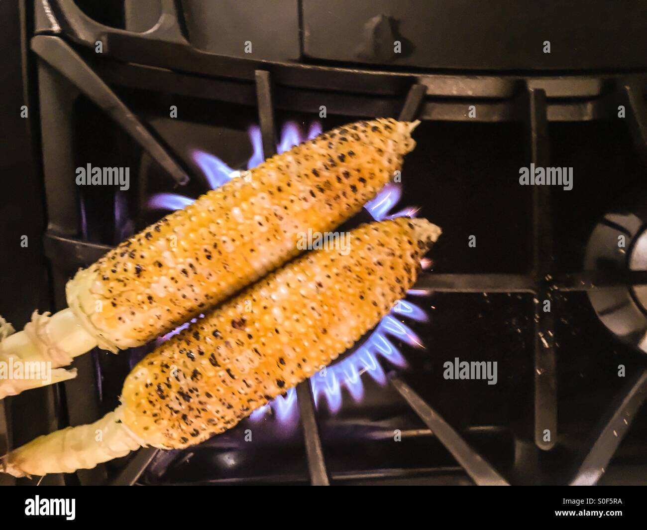 Roasting corn hi-res stock photography and images - Alamy