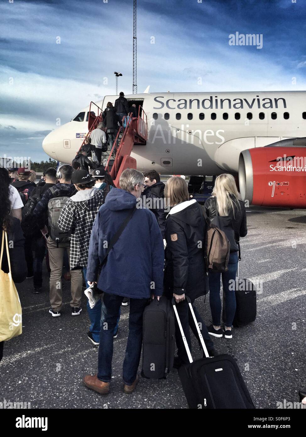 Boarding a plane Stock Photo - Alamy