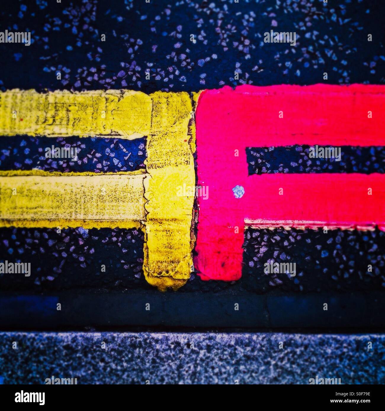 Red and yellow road markings Stock Photo - Alamy