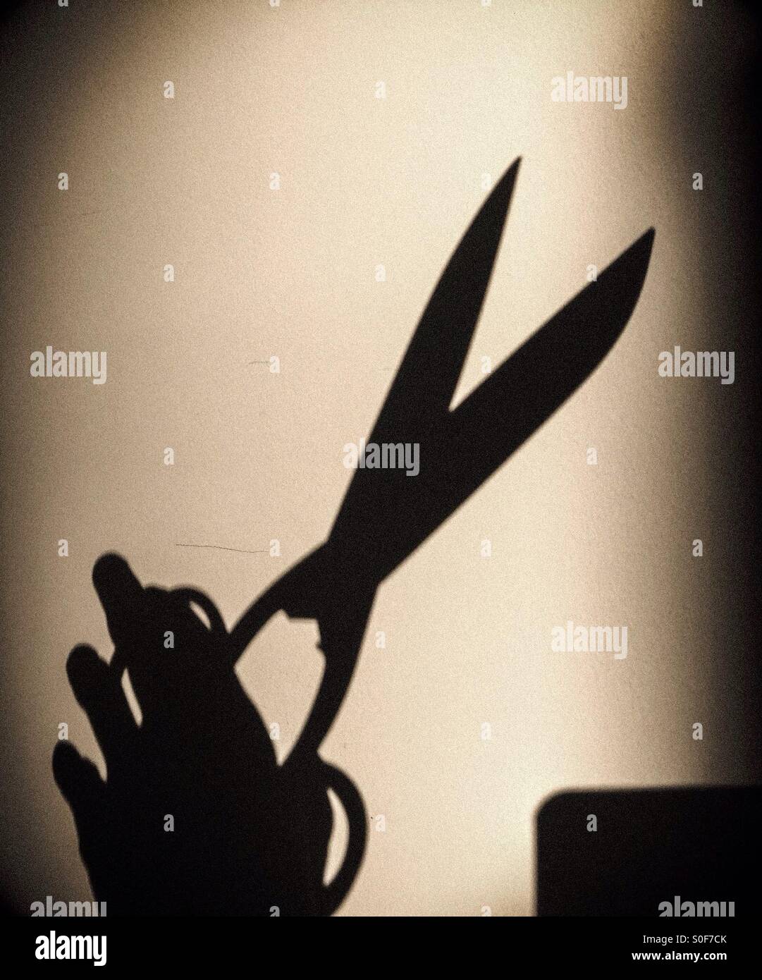 Holding scissors silhouette hi-res stock photography and images - Alamy