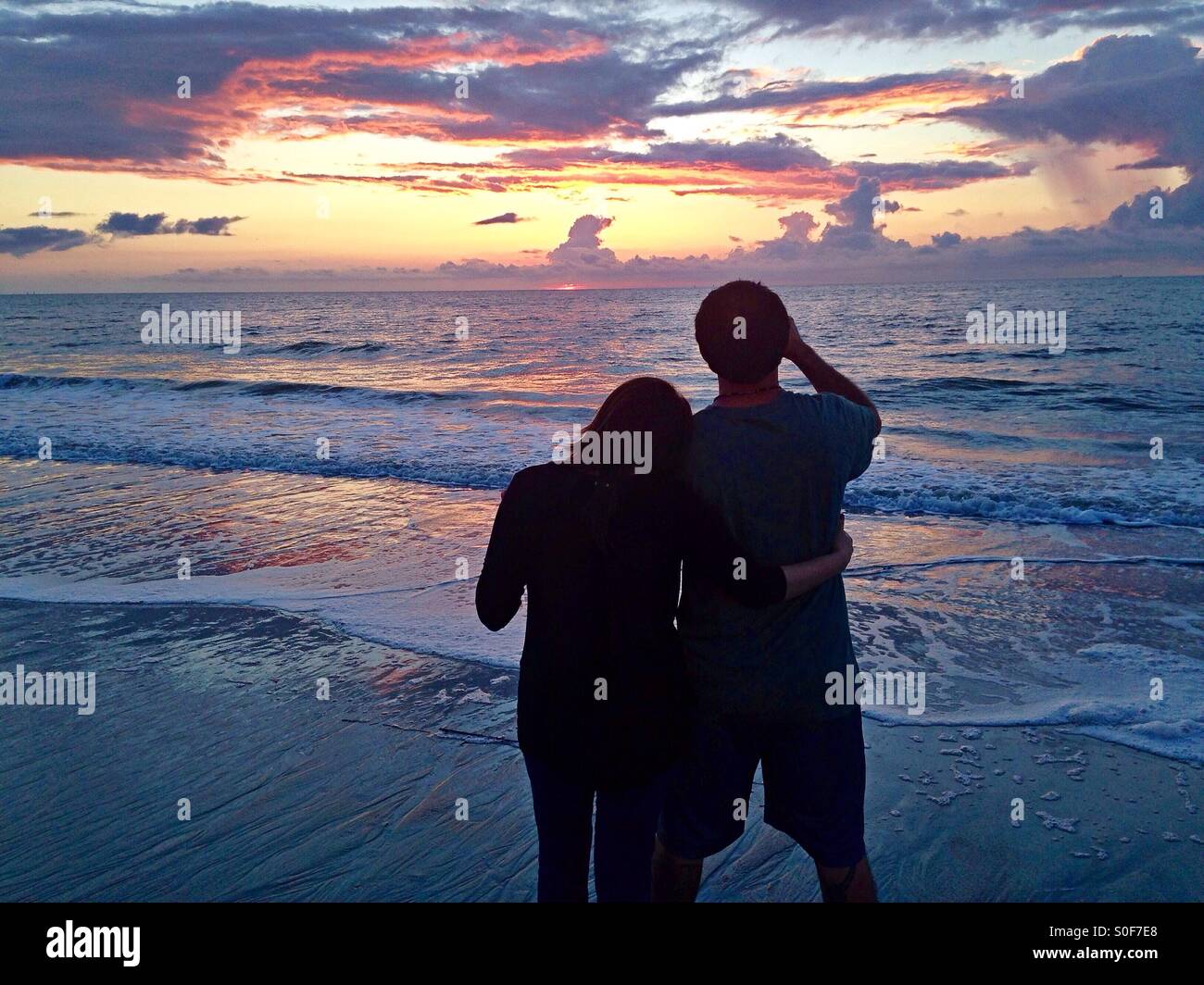 Love sunrise beach hi-res stock photography and images - Alamy