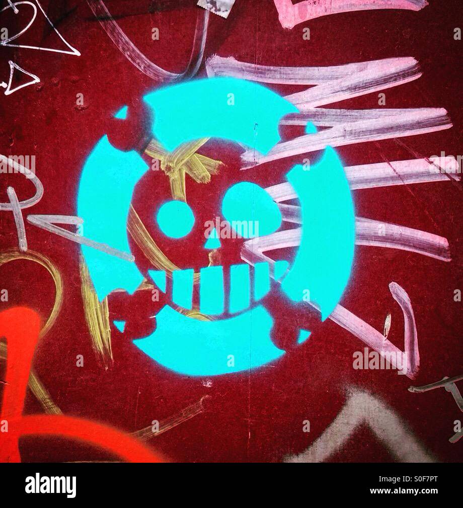 Skull-like face graffiti Stock Photo - Alamy