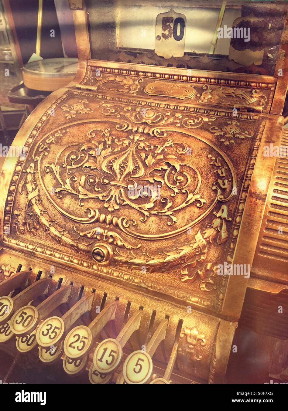 Vintage ornate brass cash register Stock Photo - Alamy