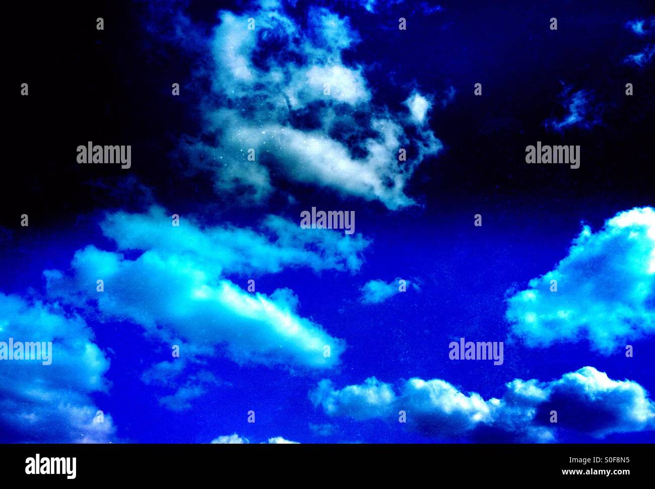 Cloudy blue sky Stock Photo - Alamy