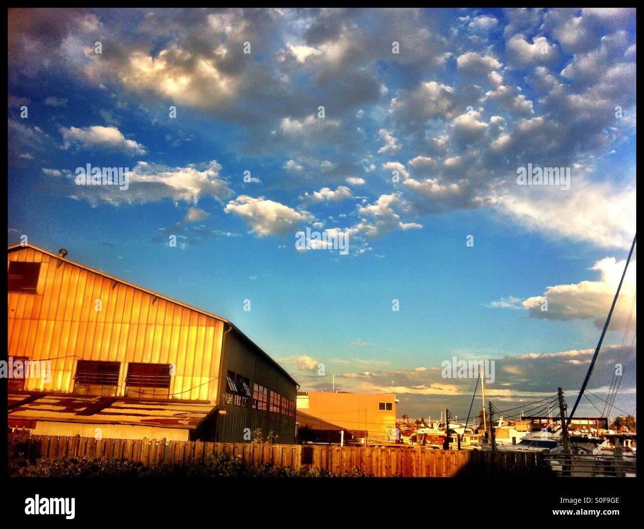 A warehouse and pretty sky Stock Photo - Alamy