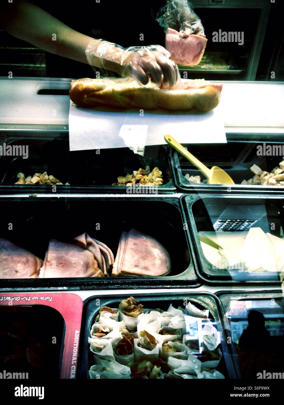 A sandwich being made in a sandwich shop Stock Photo - Alamy