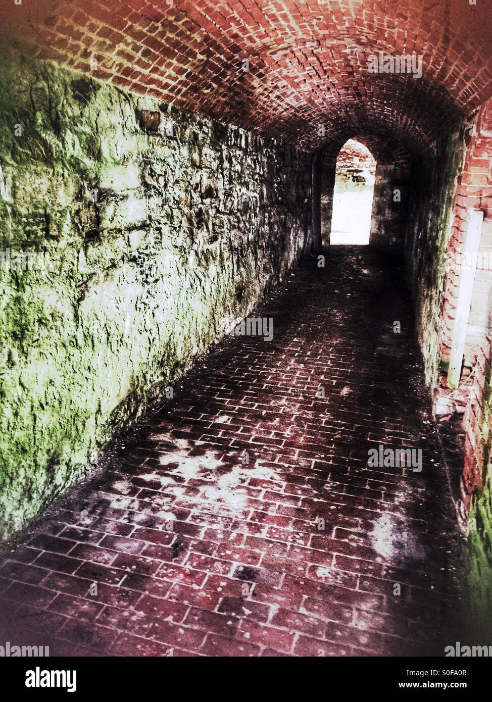 Red brick hallway Stock Photo - Alamy