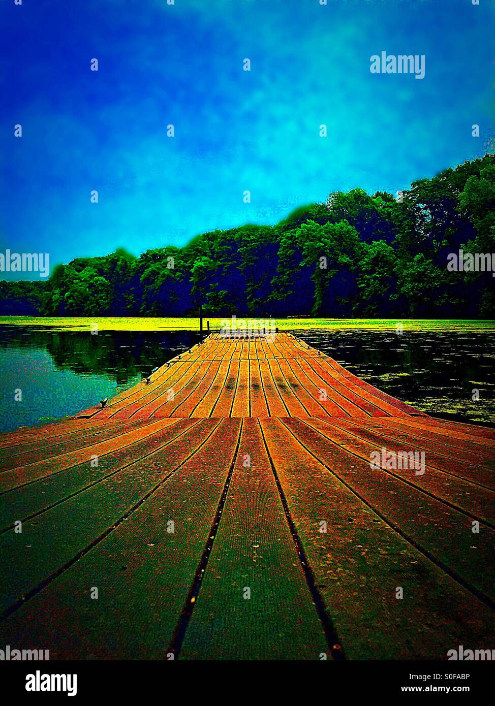 A long pier floats on a beautiful lake Stock Photo - Alamy