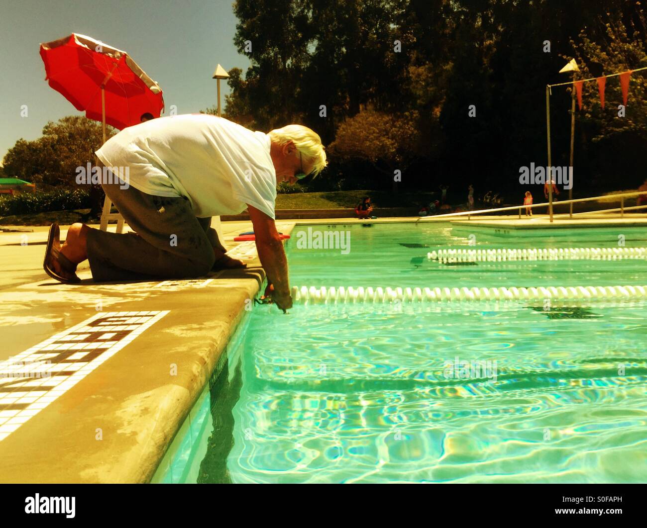 Swimming pool staff hi-res stock photography and images - Alamy