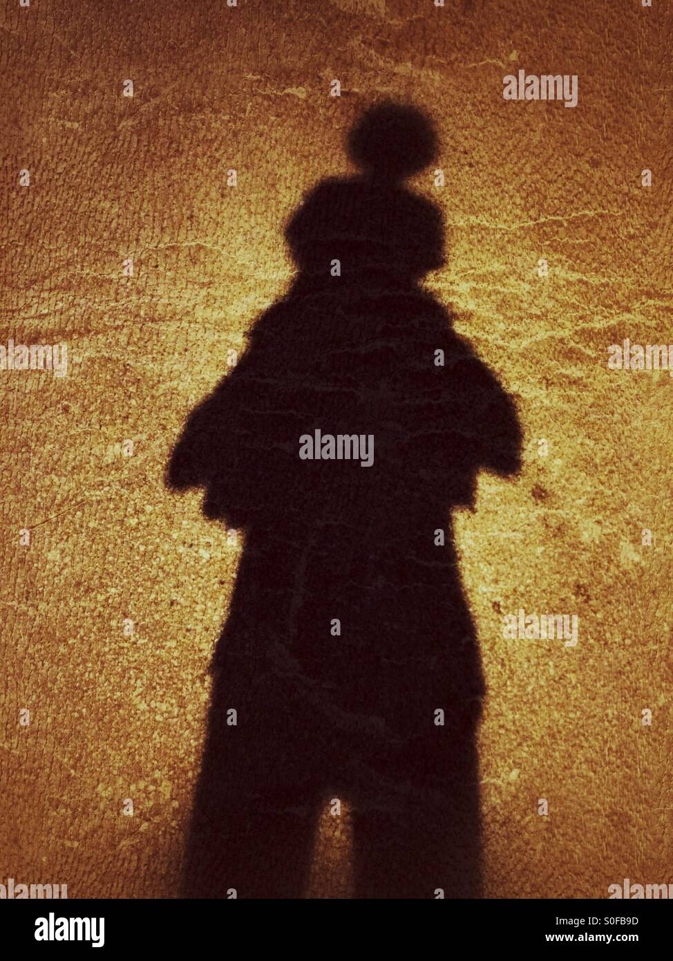 Shadow of a man carrying his son on his shoulders Stock Photo - Alamy