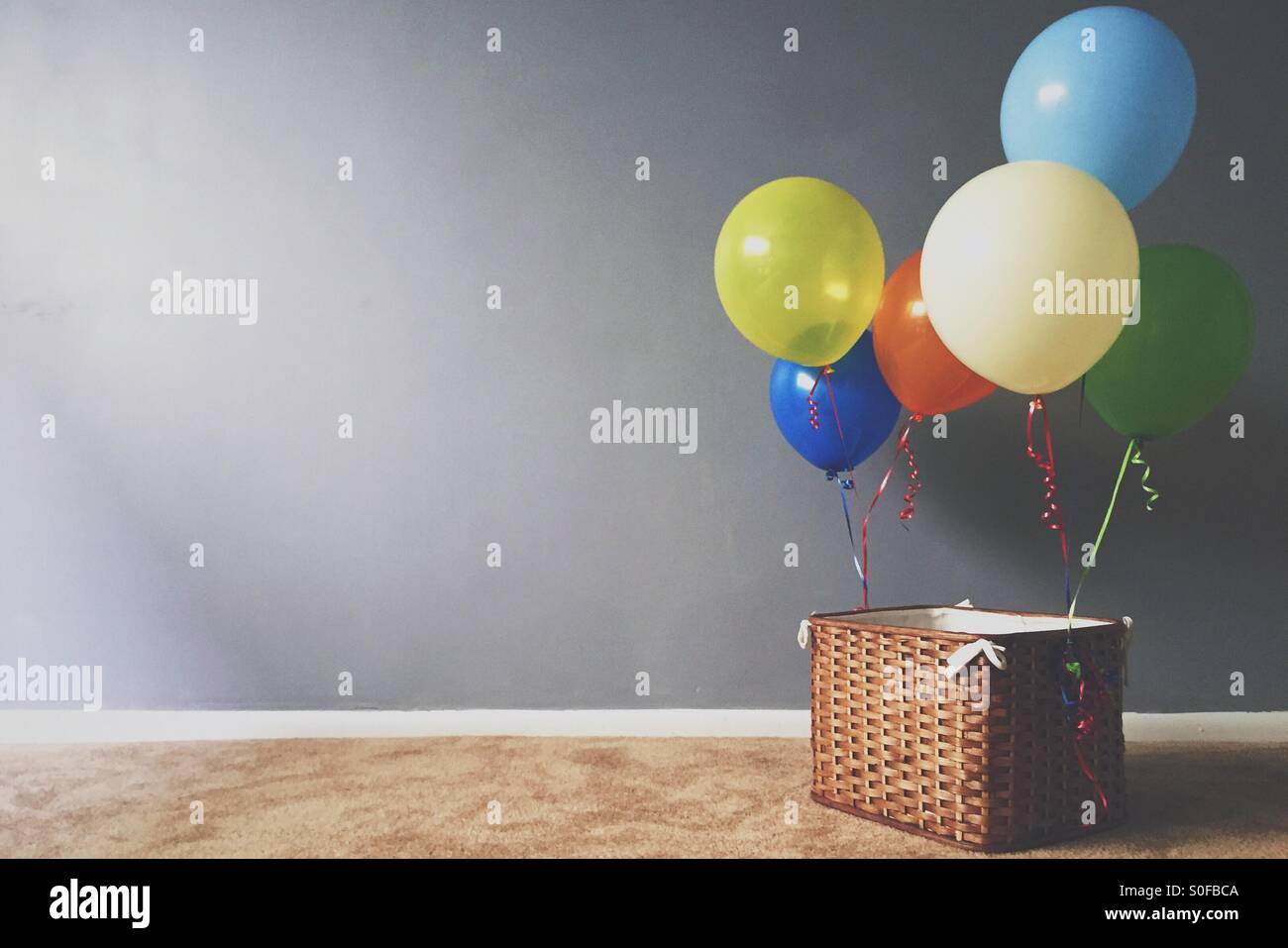 Basket and Balloons Stock Photo - Alamy