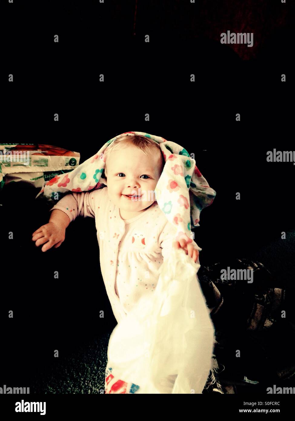 Baby girl smiles hi-res stock photography and images - Alamy
