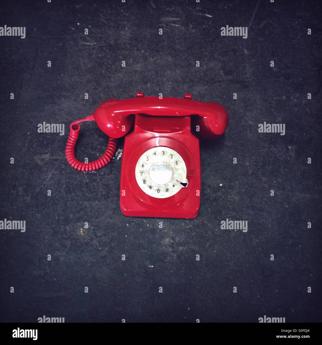 Red rotary dial telephone Stock Photo - Alamy