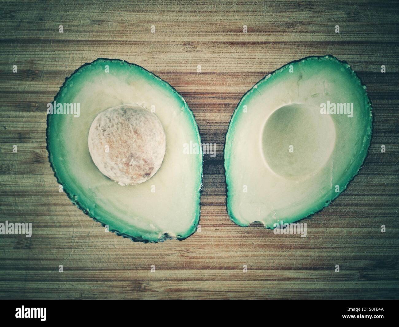 Avocado cut open hi-res stock photography and images - Alamy