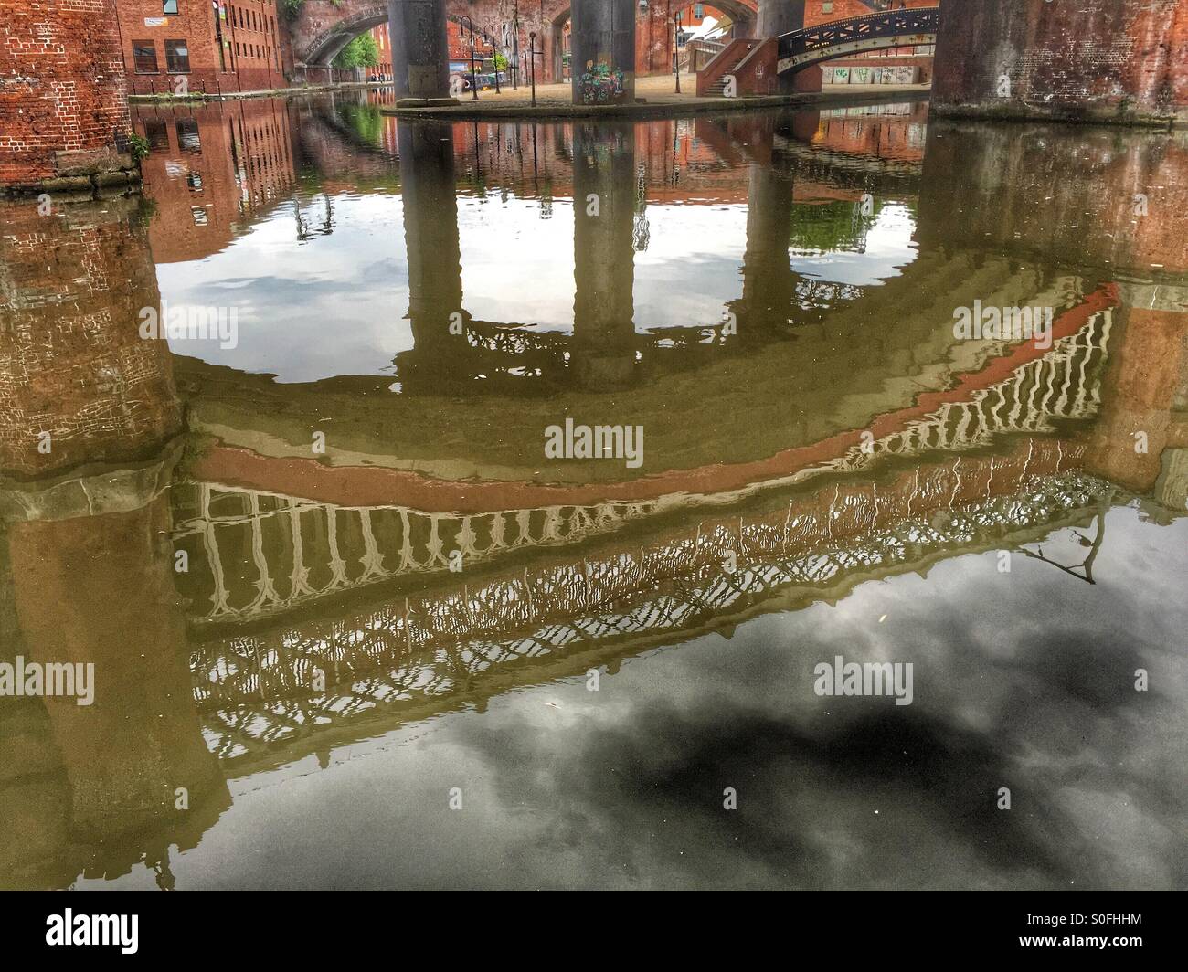 Castlefield canal railway bridge Stock Photo - Alamy