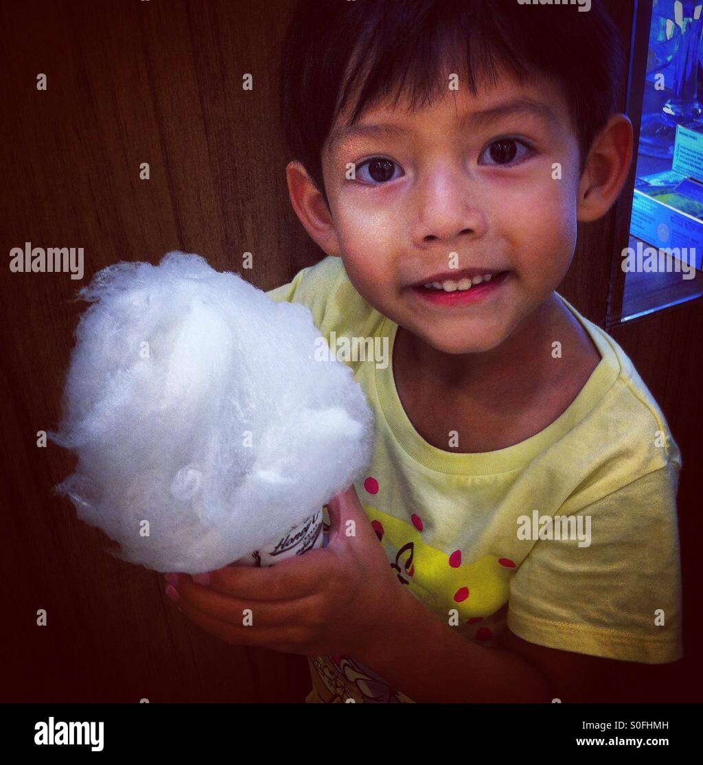 Candy floss boy Stock Photo - Alamy