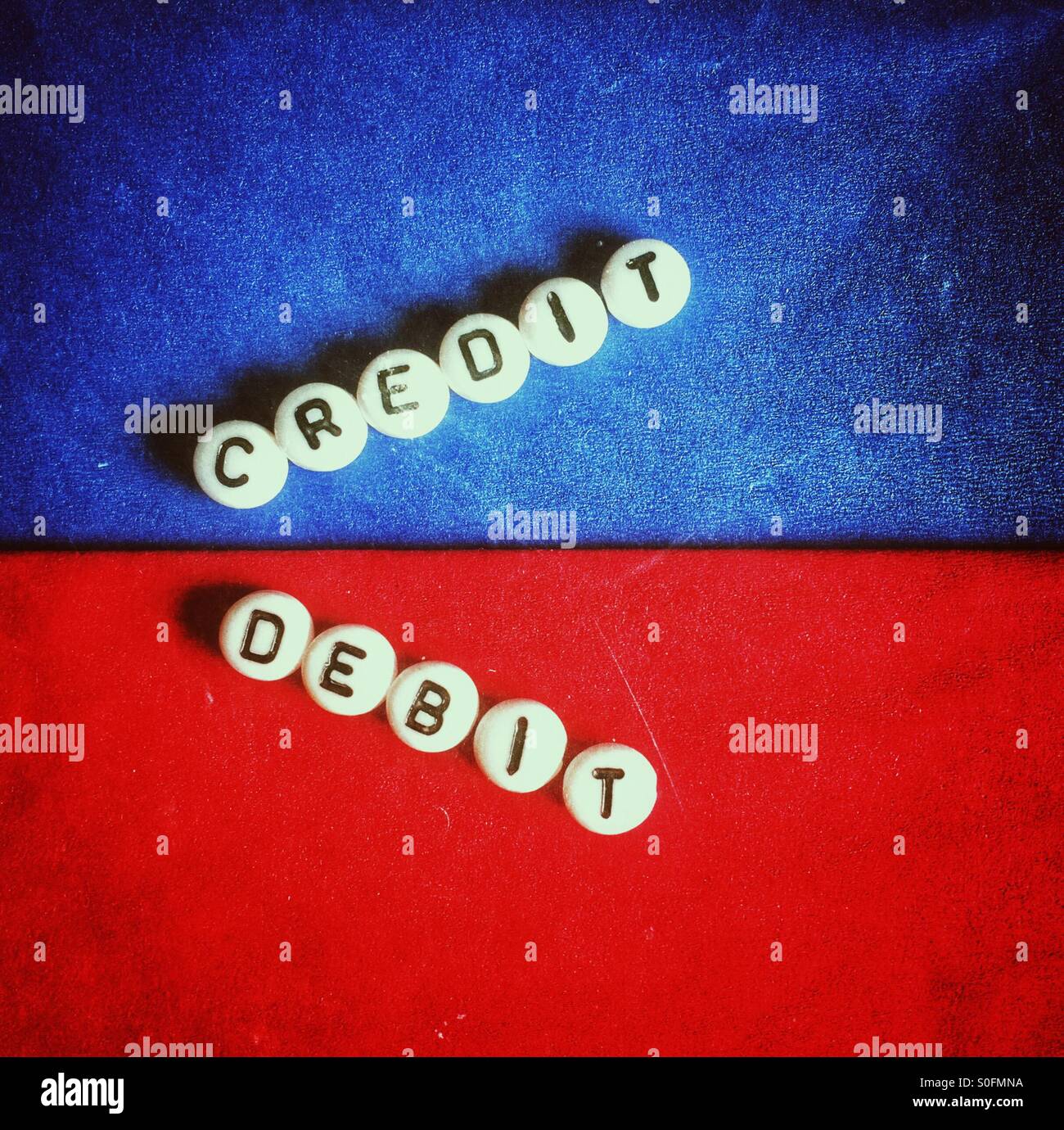 Credit and debit word Stock Photo - Alamy