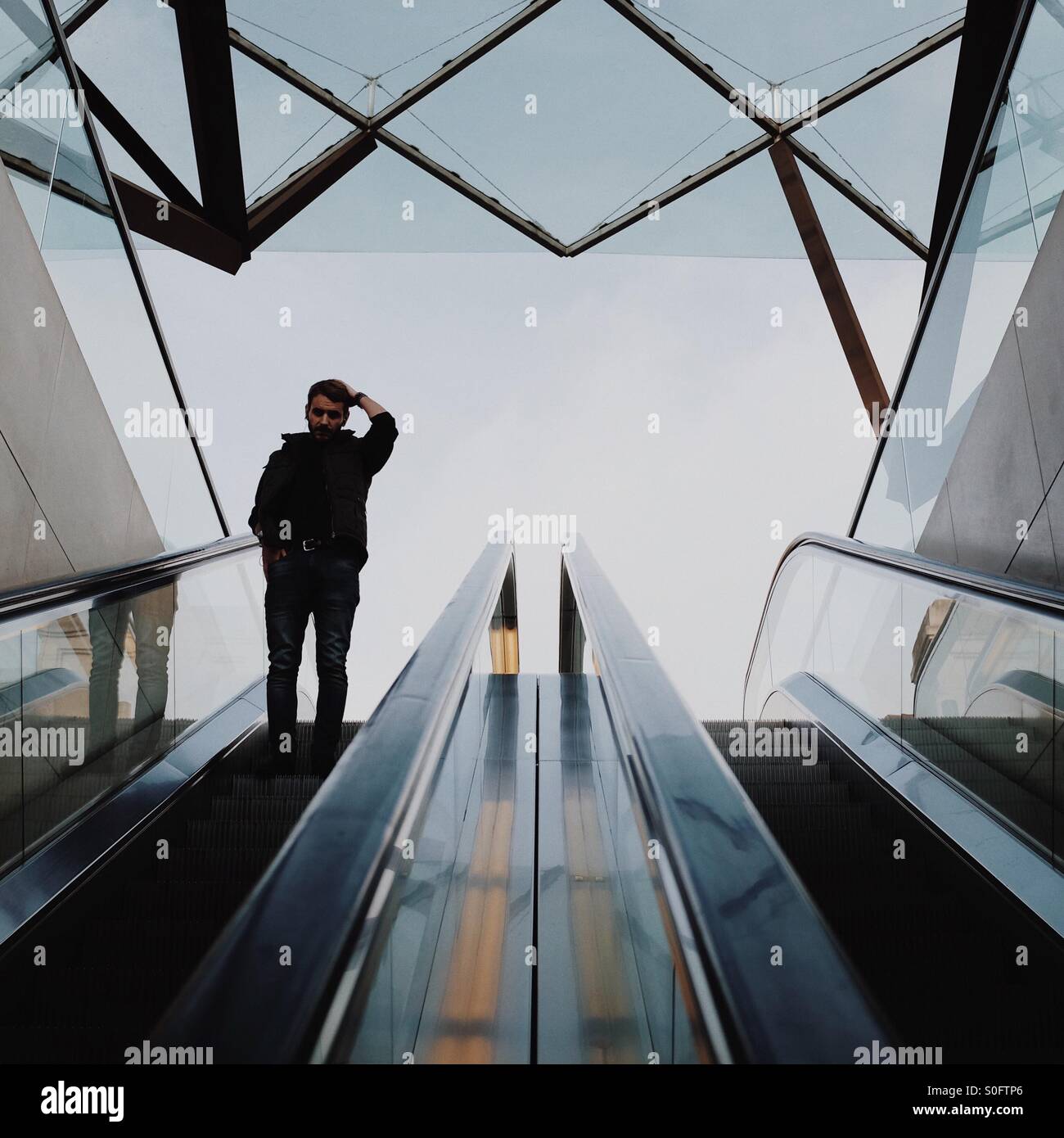 Riding An Escalator High Resolution Stock Photography and Images - Alamy