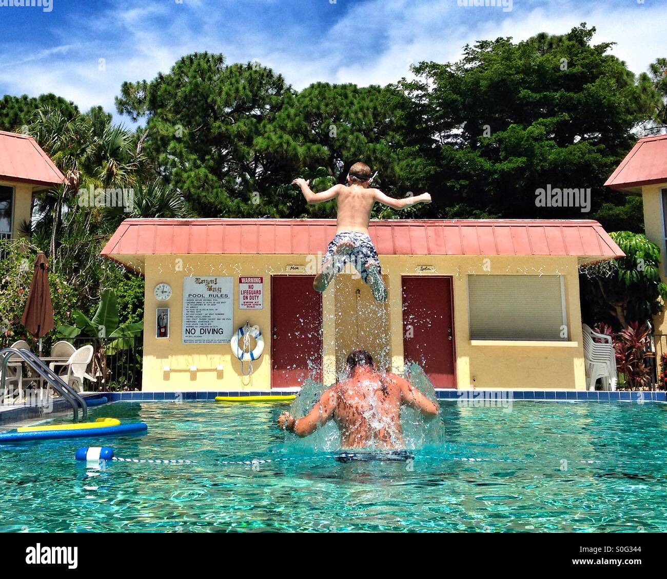 Family Jumping Into Pool High Resolution Stock Photography and Images ...