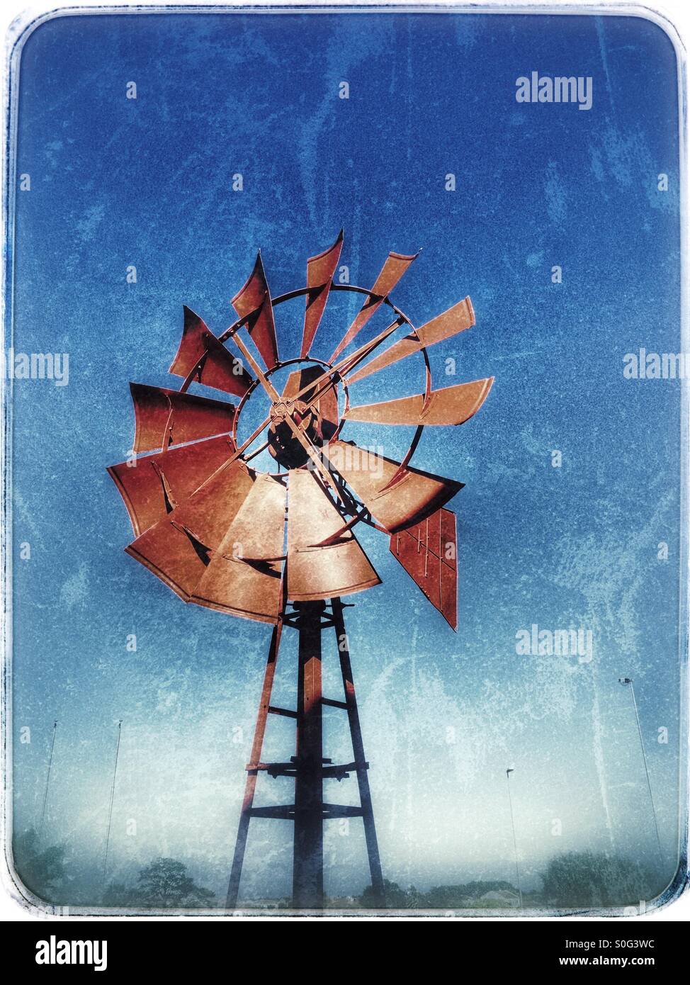 Old windmill painted red Stock Photo - Alamy