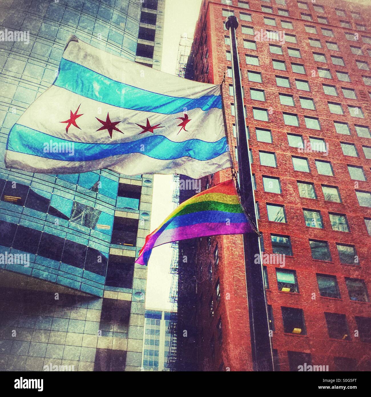 Pride flag waving along with Chicago flag in the Chicago Loop Stock Photo - Alamy
