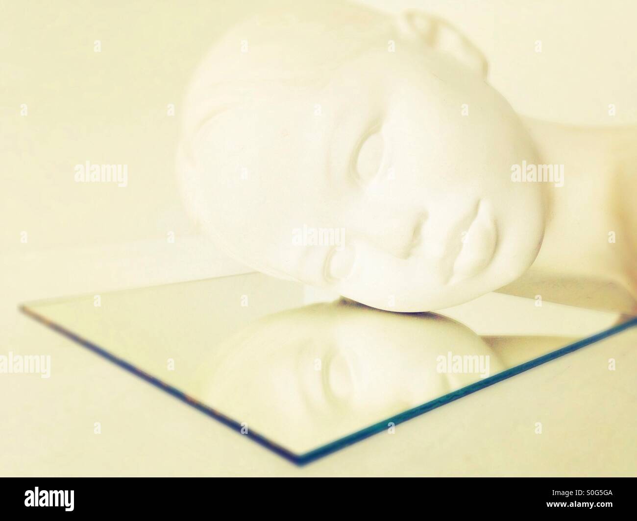 Woman face reflected in mirror hi-res stock photography and images - Alamy