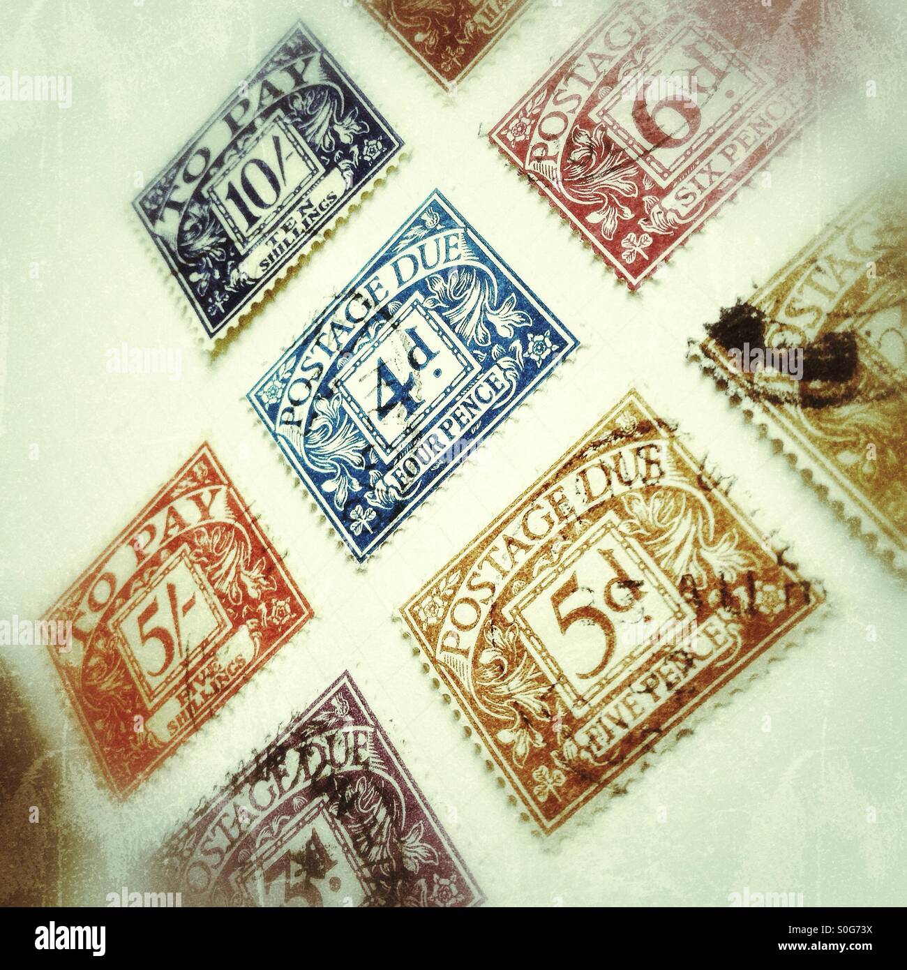Old postage due stamps in a stamp album Stock Photo - Alamy
