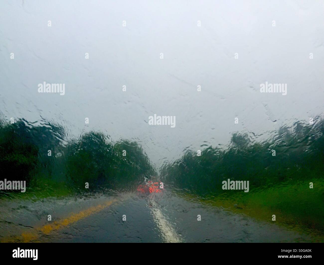 Rain blurred car windshield hi-res stock photography and images - Alamy