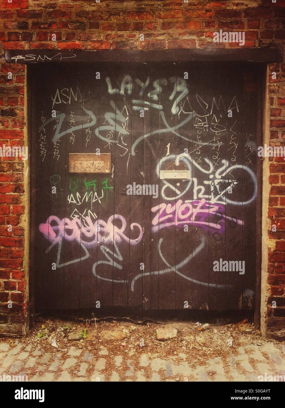 Graffiti on doors hi-res stock photography and images - Alamy