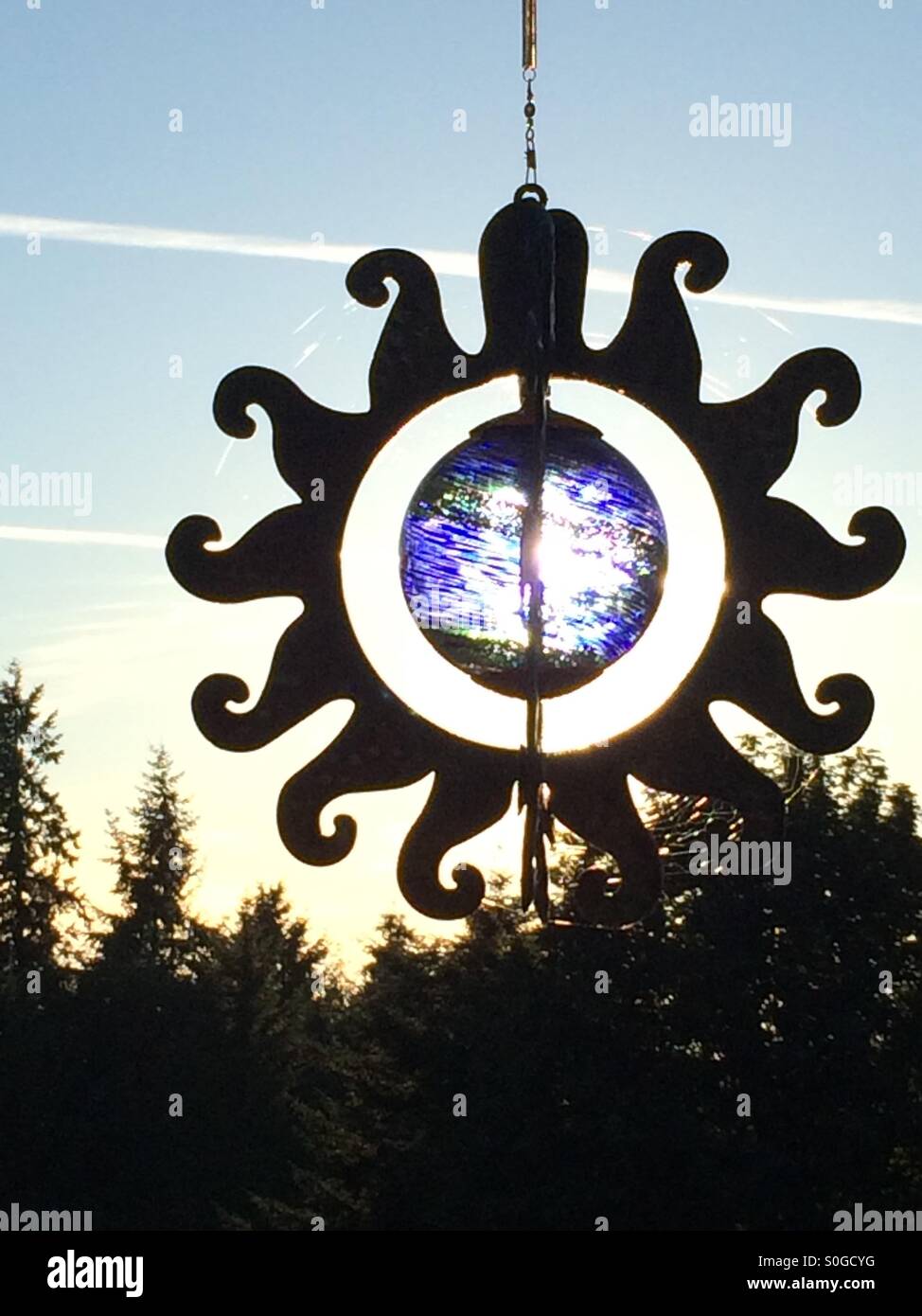 The sun caught directly behind the sun catcher for a beautiful ...
