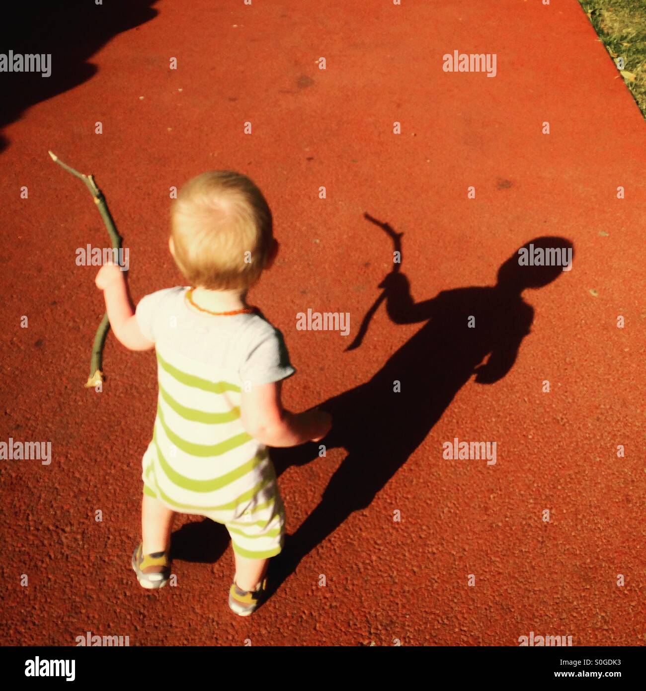 Boy running in adventure playground hi-res stock photography and images ...
