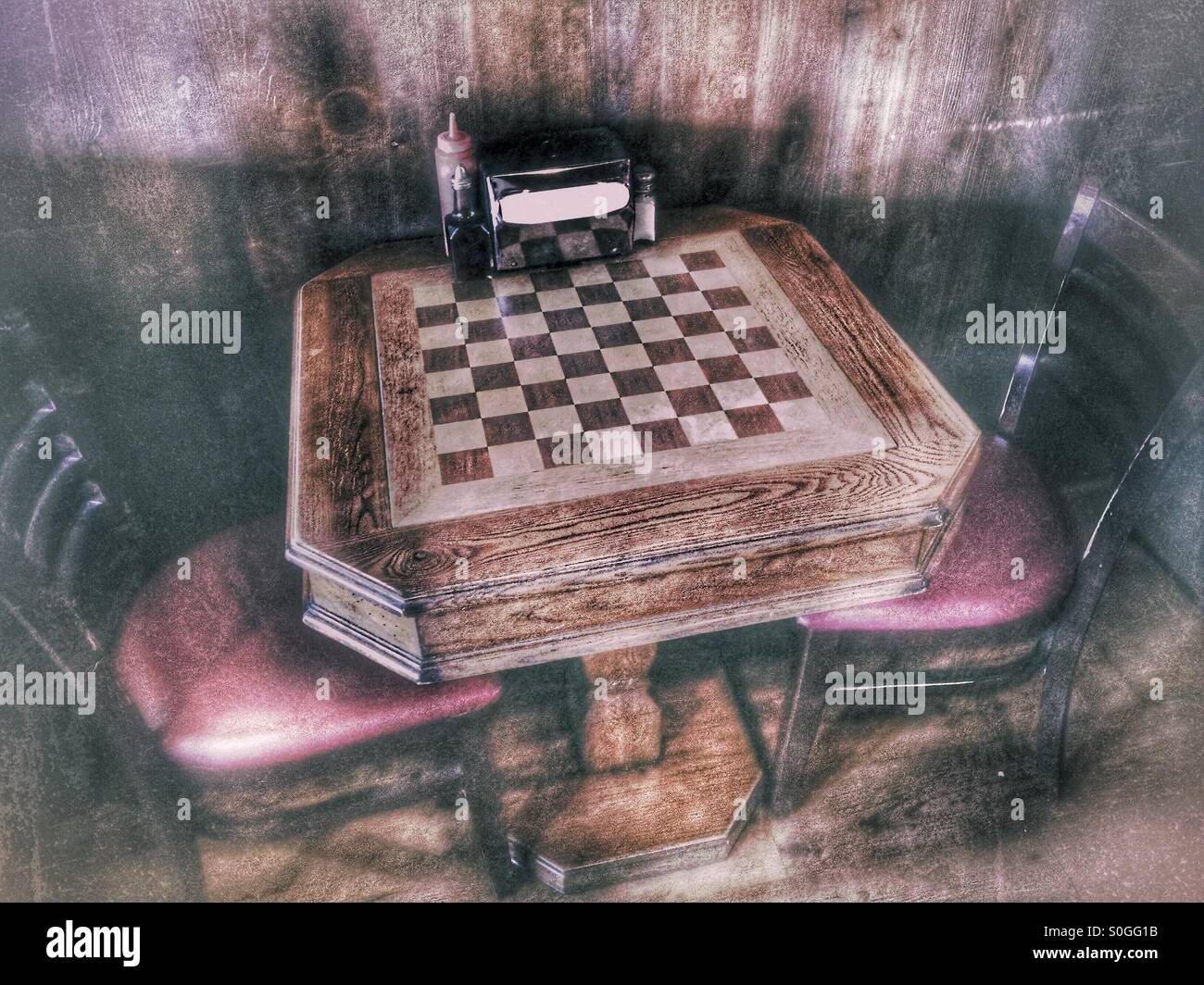 Checker Board table at restaurant Stock Photo - Alamy