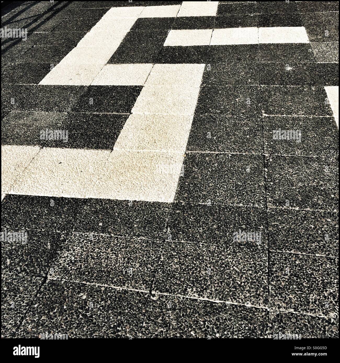 Geometric shape on paving Stock Photo - Alamy