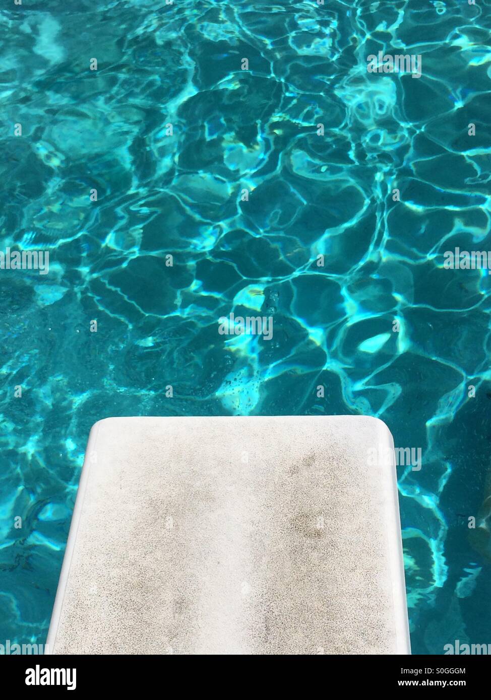 Diving board over pool Stock Photo - Alamy