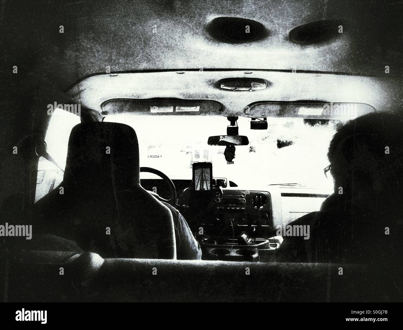 Customer riding in super shuttle from airport Stock Photo - Alamy