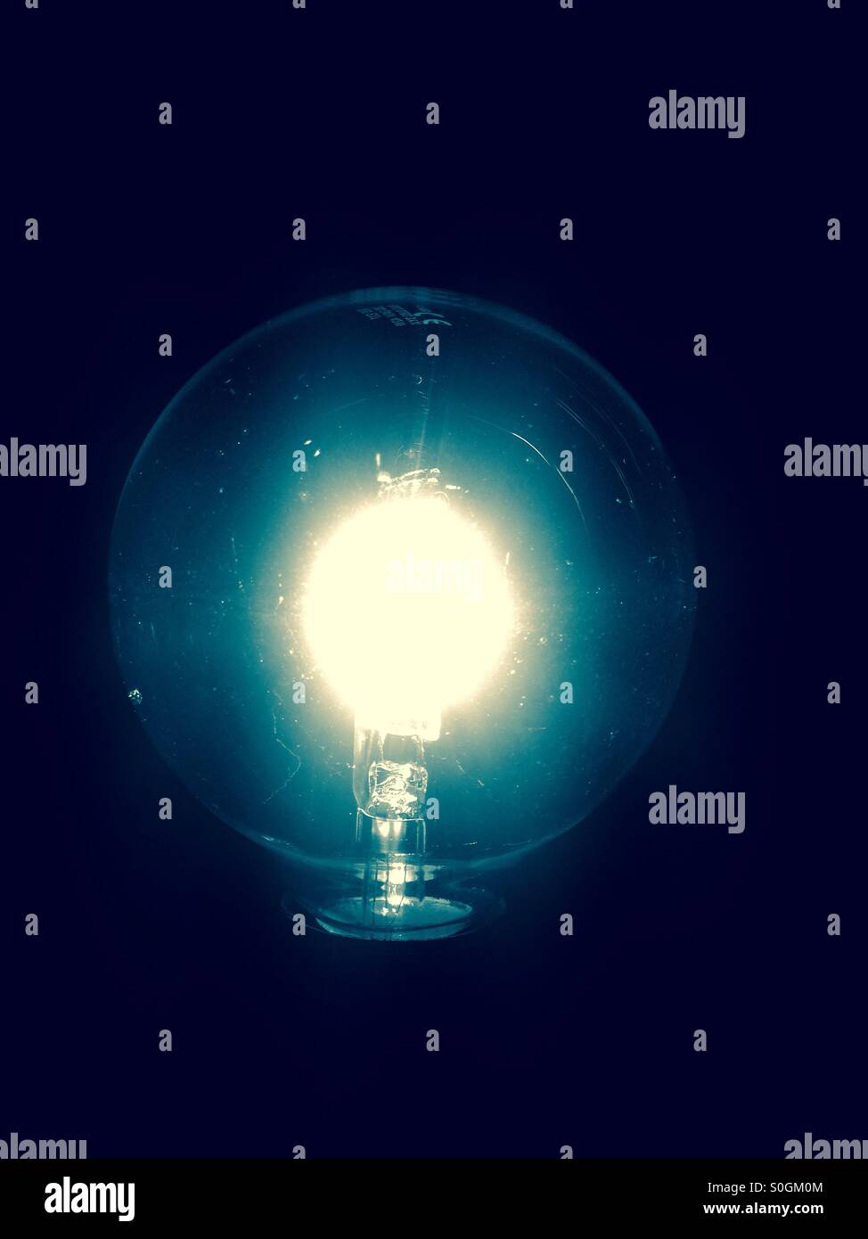 Glow from a lightbulb Stock Photo - Alamy