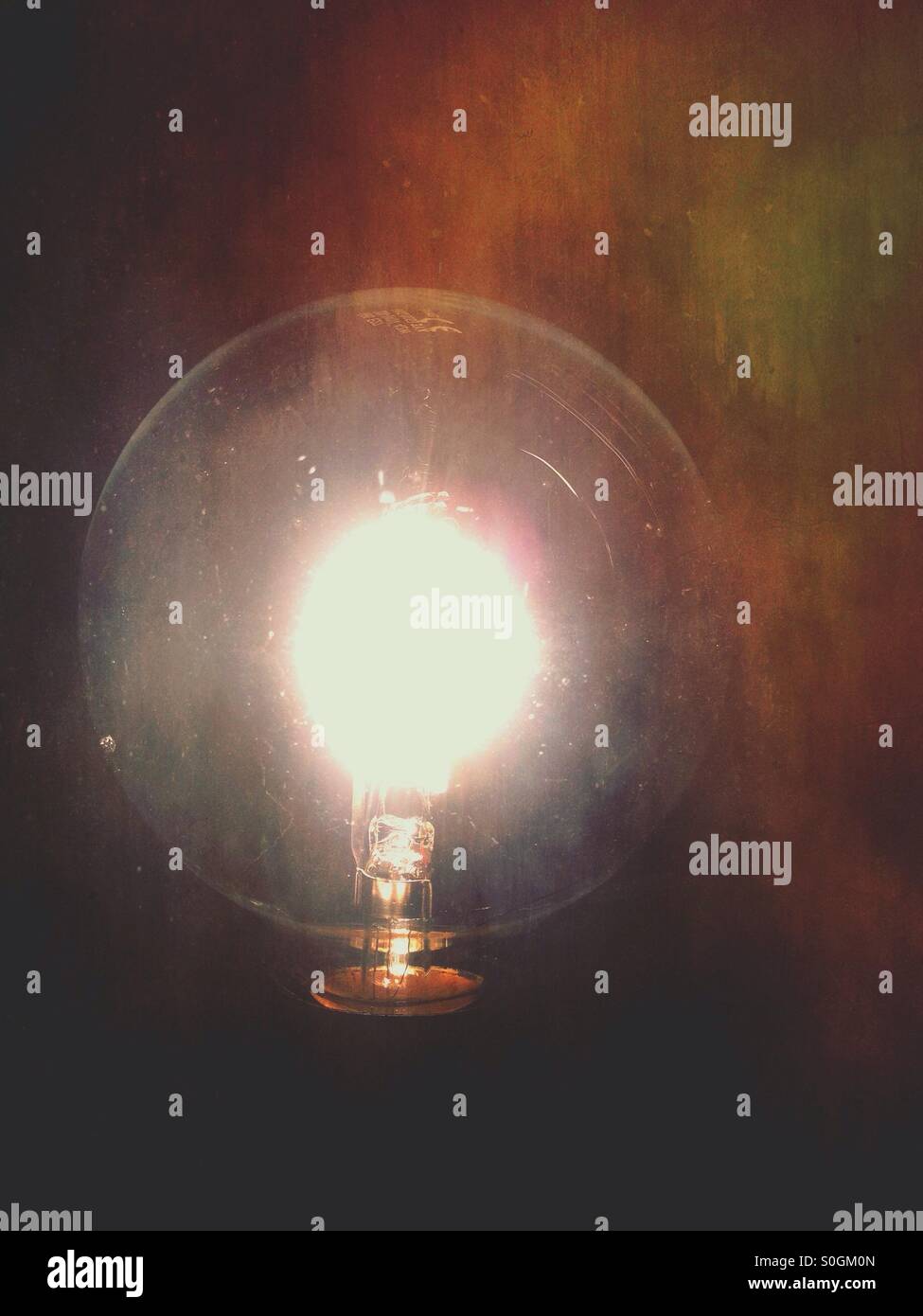 Glow from a lightbulb Stock Photo - Alamy