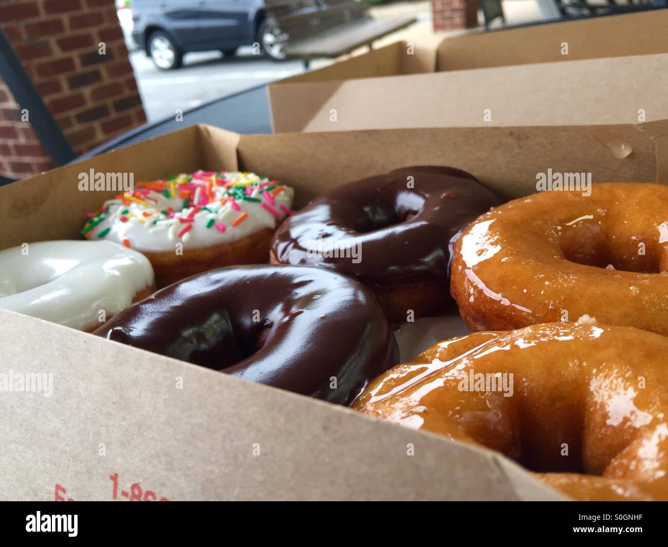 Hot fresh donuts hi-res stock photography and images - Alamy