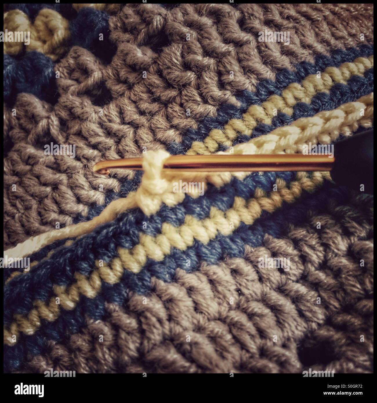 Crochet needle in crochet work Stock Photo - Alamy