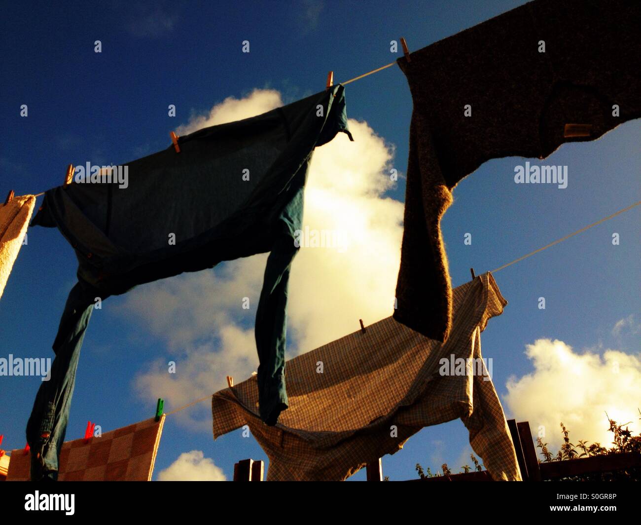 Laundry drying outside Stock Photo - Alamy