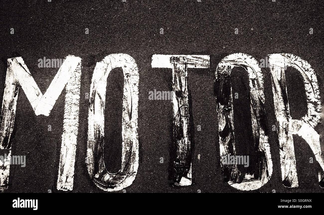 The word motor on asphalt Stock Photo - Alamy