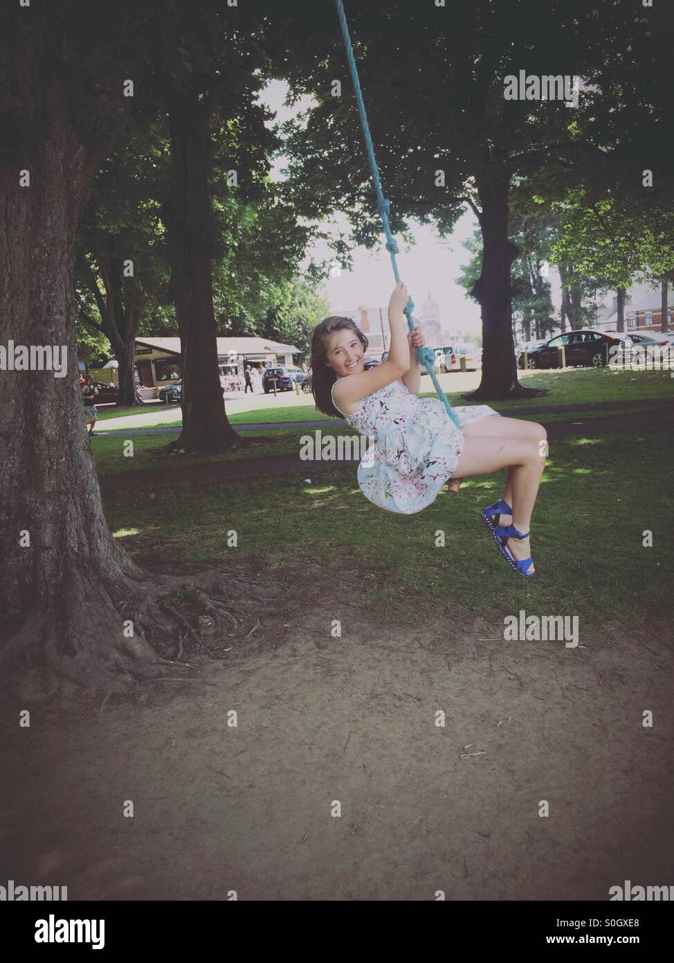 Girl rope swing Stock Photo - Alamy