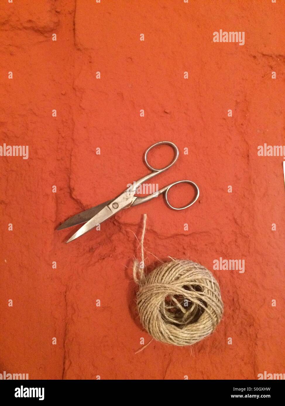 Rope and scissors Stock Photo - Alamy