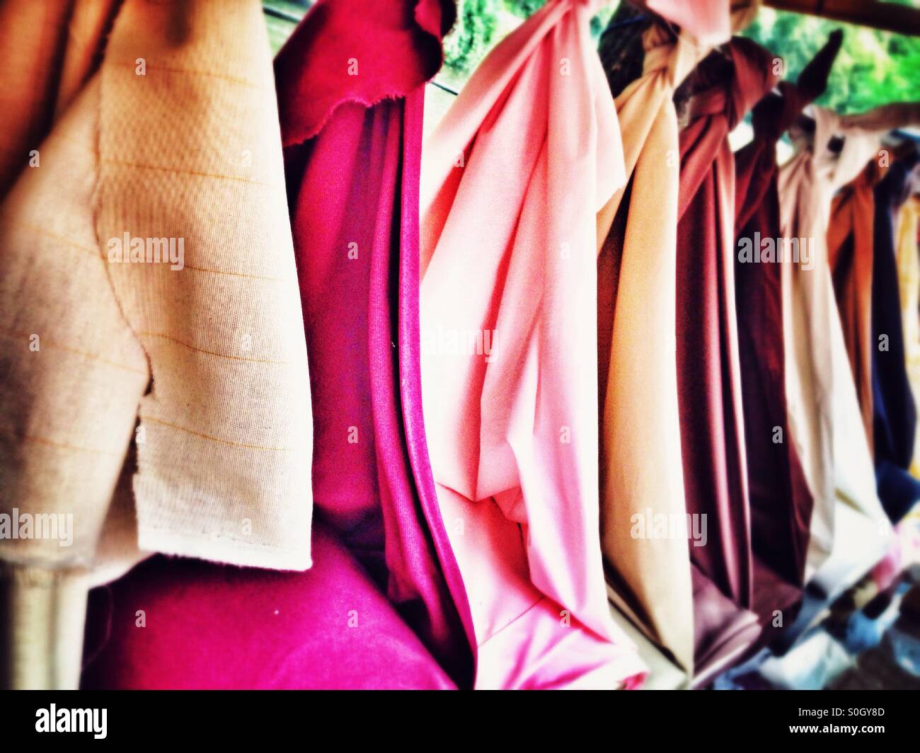 Cloth fabrics colourful market hi-res stock photography and images - Alamy