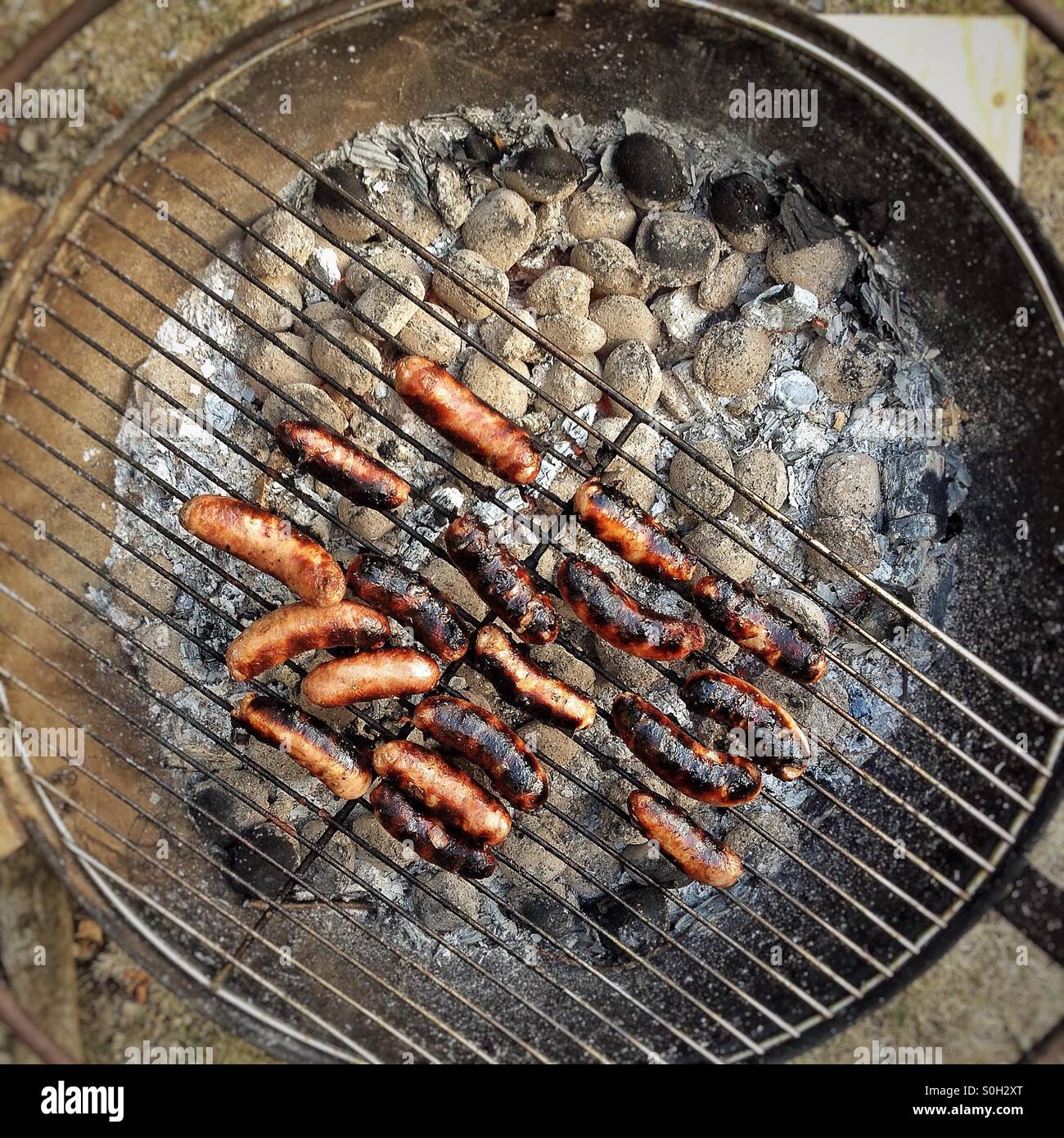 Cooking sausages on bbq hi-res stock photography and images - Alamy
