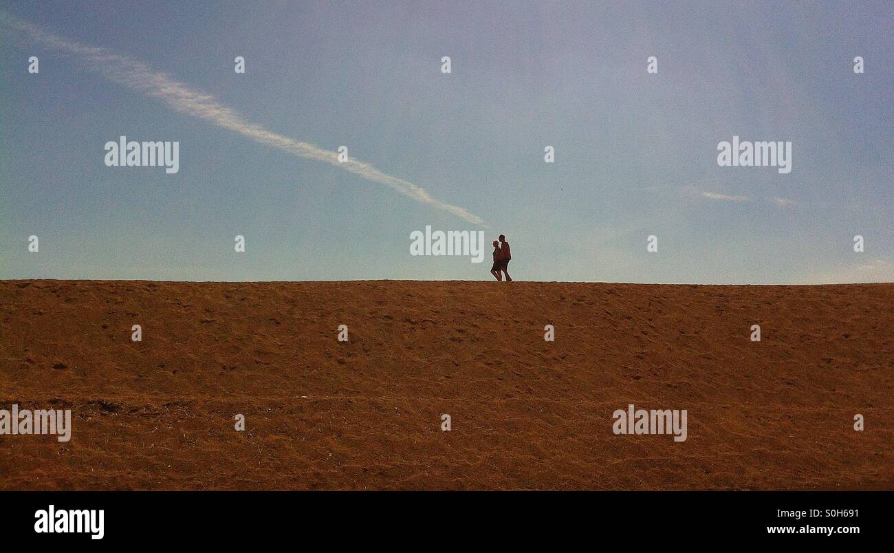 Just a walk on the beach Stock Photo - Alamy