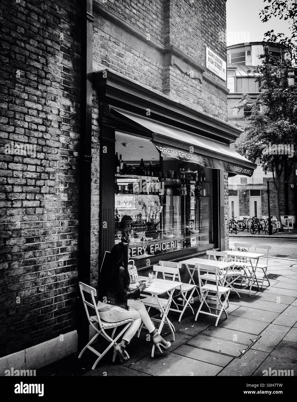 Typical street cafe in london hi-res stock photography and images - Alamy