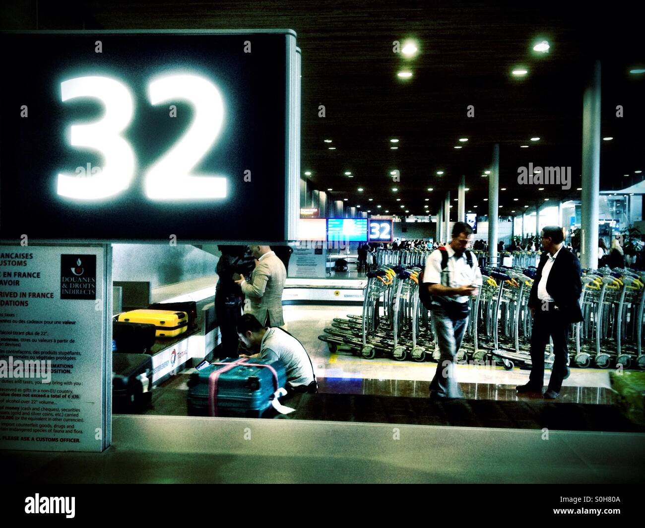 Baggage reclaim belt 32 at Charles de Gaule airport in Paris Stock ...