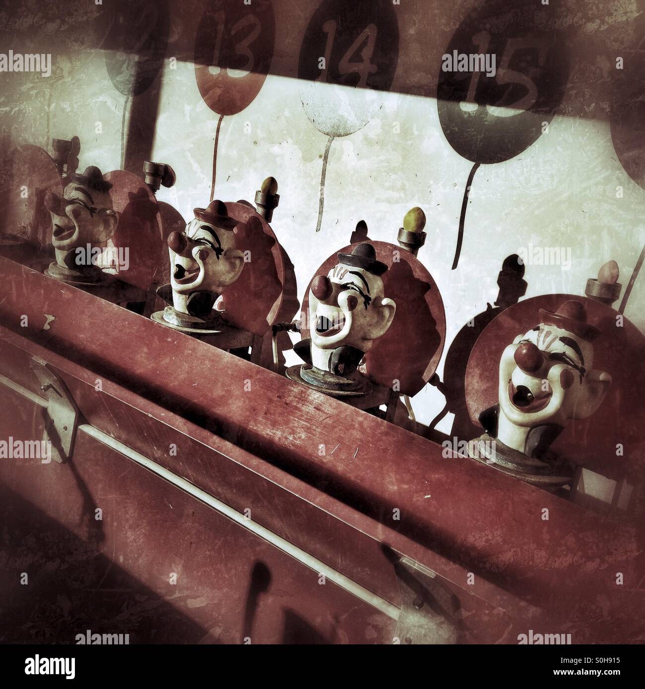 Water pistol game at the county fair Stock Photo - Alamy