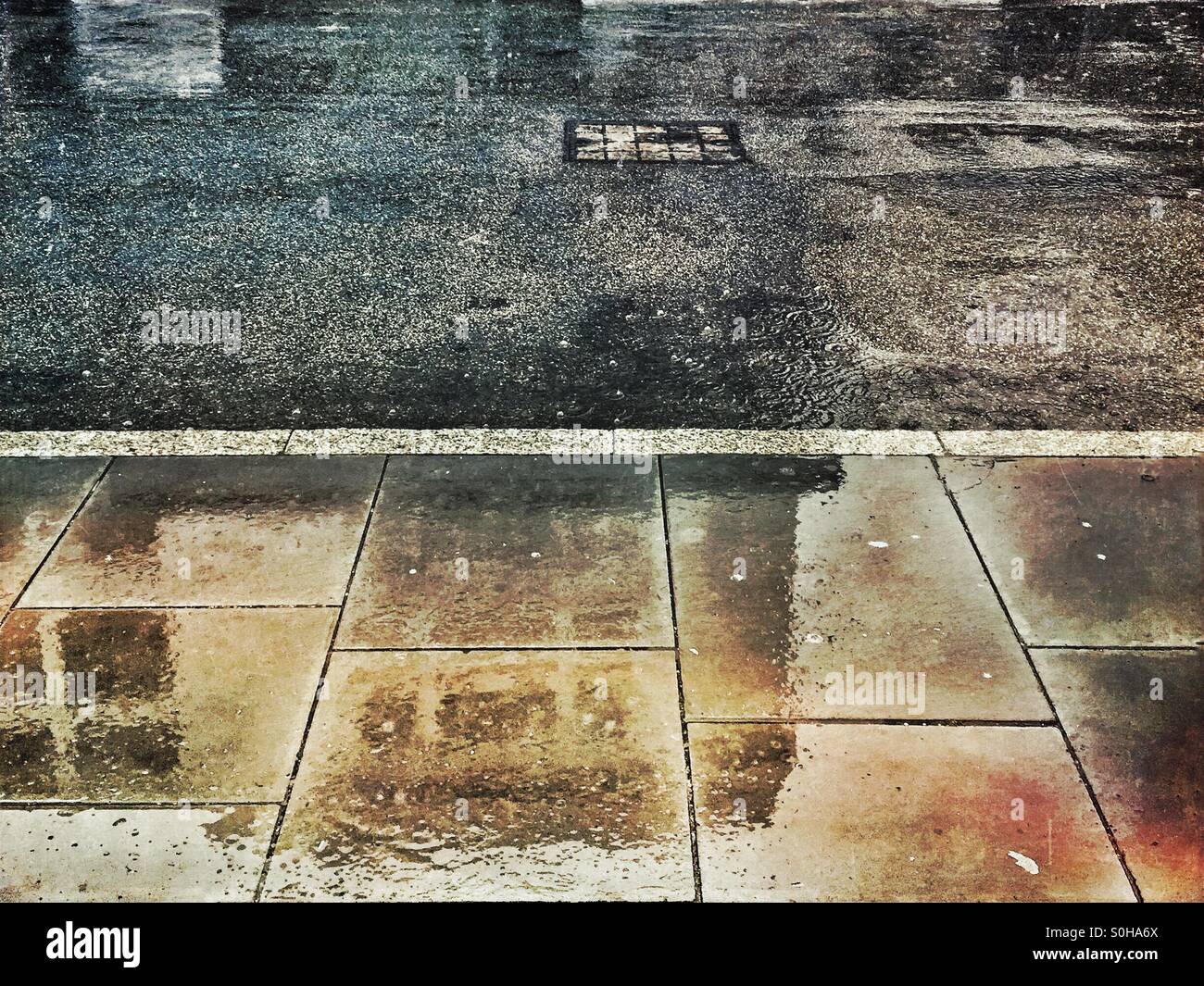 Rain reflections on shiny pavement hi-res stock photography and images ...